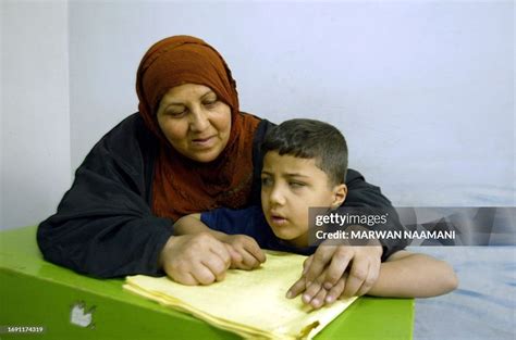 Samira Mahdi Teaches Her Blind Six Year Old Son Murtada Ibrahim At News Photo Getty Images