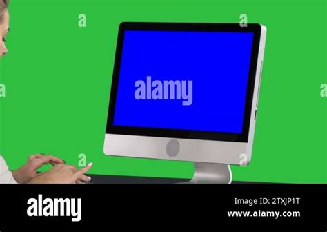 Woman Using Computer On A Green Screen Chroma Key Blue Screen Mock Up Display Stock Video