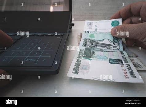 Man Presses A Calculator Button With His Finger Man Counting Ruble Cash Accounting A