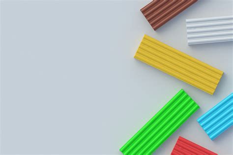 회색 배경에 화려한 플라스틱 벽돌이 흩어져 있다 모델링 점토 아이들을위한 장난감 유치원 교육 평면도 복사 공간 3d 렌더링 0
