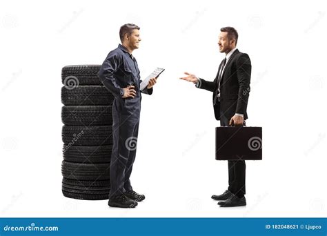 Automechaniker Der Mit Einem Geschäftsmann Spricht Stockbild Bild von profil getrennt
