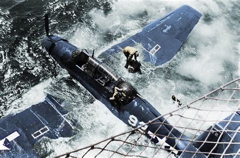 The Crew Of A Grumman Tbf Avenger Torpedo Bomber Scramble To Safety