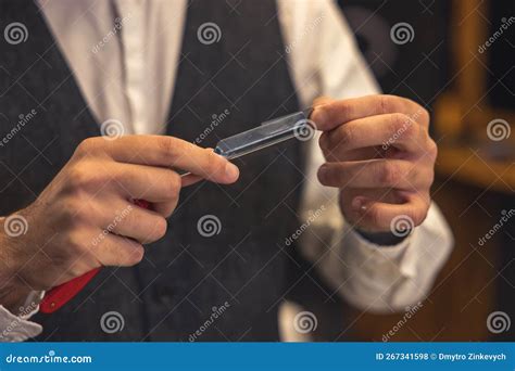 Barber Checking The Razor Sharpness Stock Photo Image Of Sharp Wellbeing 267341598