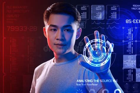 Careful Software Developer Touching The Screen While Passing A Security Control Stock Image