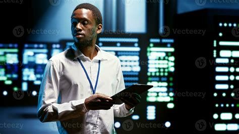 It Programmer Using Tablet To Run Diagnostics On Server Hardware