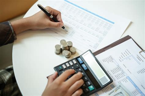 premium photo businessman saving money analyzing investment charts