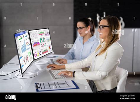 Analyst Woman Looking At Business Data Analytics Dashboard Stock Photo Alamy