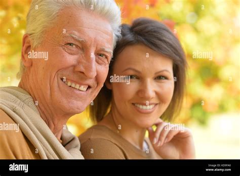 Woman Hugging Father Stock Photo Alamy