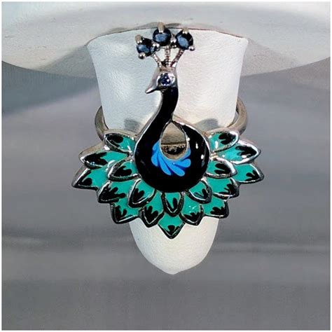 Peacock Ring With Three Blue Topaz Silver Papillon