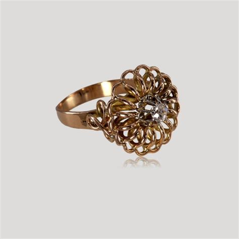 Proantic Son Ring Forming A Flower And Central Diamond Circa 1950