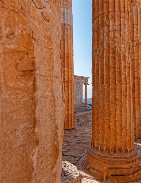 Acropolis View Between Columns To The Small Ionian Style Athena Nike