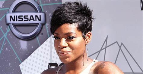 Fantasia Rocks Fiery Pixie Cut And Shows Off Her Tattoos In Cropped Camo Top And Pants In Photo