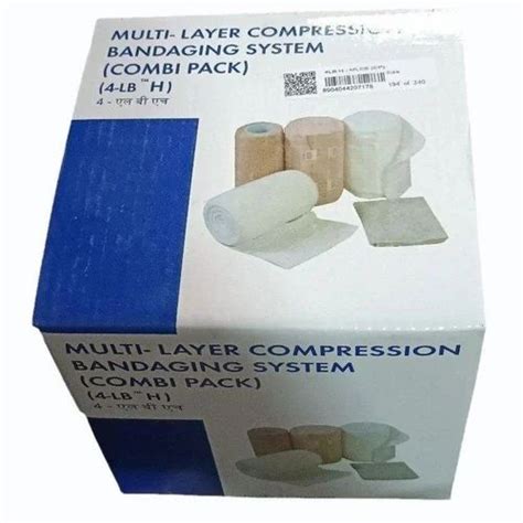 White And Beige Multi Layer Compression Bandaging System For Personal