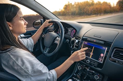 Free Photo Woman Using Navigation System While Driving A Car