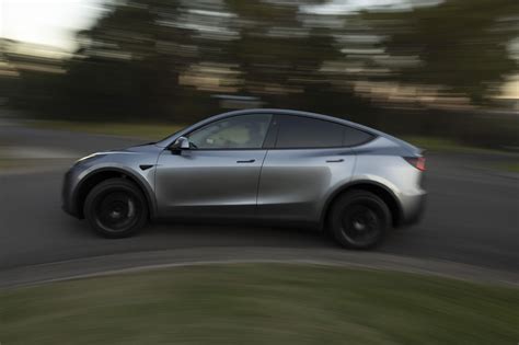 Tesla Model Y Vs Xpeng G6 Comparison Carexpert