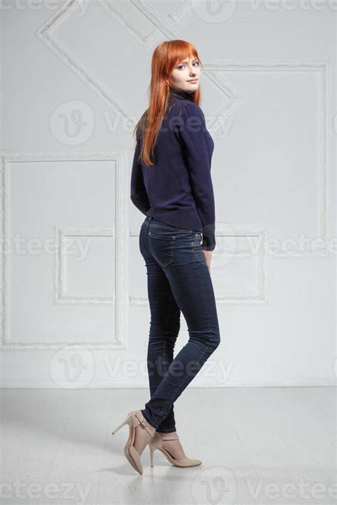 Alluring Redhead Woman Posing In Studio Stock Photo At Vecteezy
