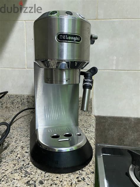 ماكينة قهوة ديلونجي ديديكا Ec685 مستعملة بحالة ممتازة مع ملحقات إضافية