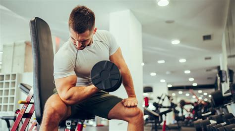 How To Do The Preacher Curl For Building Bigger Biceps Breaking Muscle