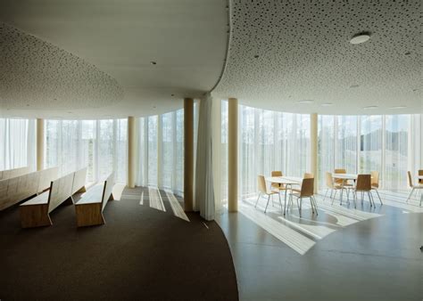 Plan 01s Crematorium Is Covered In Ribbed Concrete And Glass