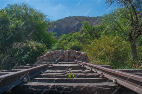 Premium Photo Concrete Buffer Stop Sign That Ends Railroad Tracks