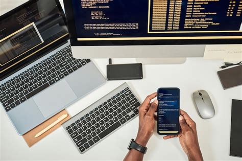 Premium Photo Hands Of Software Developer Testing Code Of Mobile