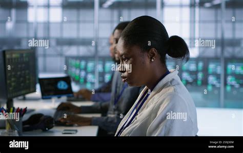 African American Data Center Technicians Implement Ai Predictive Maintenance Systems Woman In