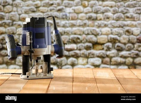 Milling Cutting Tool Machine On A Wooden Workbench In A Craftsmans Workshop A Blurred Bricks