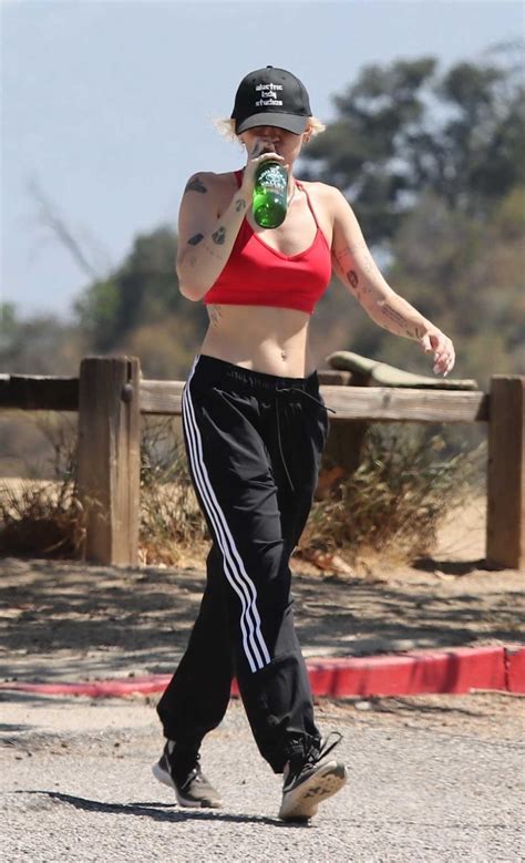 Miley Cyrus In A Red Sports Bra Was Seen While Hiking Out In The