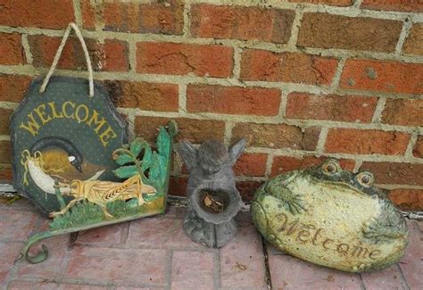Grouping Of Outdoor Décor With Cast Iron Grasshopper And Cement Mold Frog Gc5 Auctions