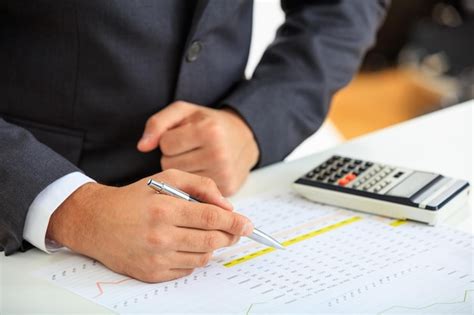Premium Photo Manager Studying A Data Analysis Report Premium Photo Manager Studying A Data Analysis Report