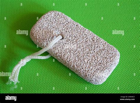 skincare tool display pumice stone with string presented on vibrant