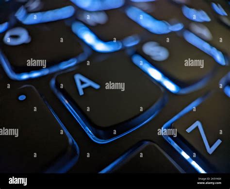 Closeup View Of A And Z Keys On A Black Laptop Keyboard With Glowing Blue Lights Stock Photo Alamy