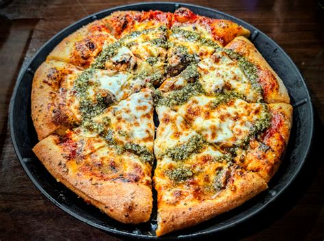 What Is Louisville Style Pizza? - Satisfying Slice