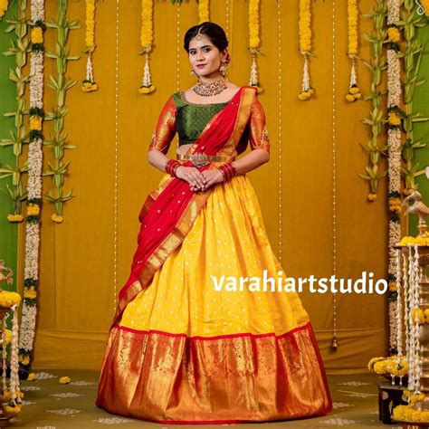 Stunning Traditional Yellow Color Kanchi Pattu Lehenga And Green Blouse With Kanchi Pattu