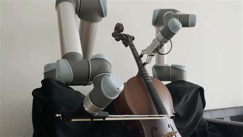 a cello playing robot makes music with its human programmer nerdist