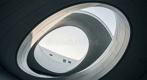 Curved Architectural Structure With Concentric Openings Creating A Dynamic Fl Stock