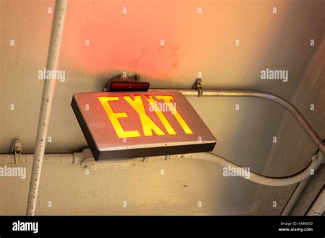 Illuminated Exit Sign In A Building Stock Photo Alamy