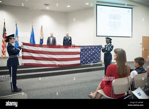 Members Of The Keesler Honor Guard Conduct A Flag Folding Ceremony