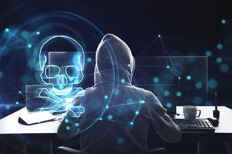 Premium Photo Back View Of Hacker At Desk Using Laptop With Digital