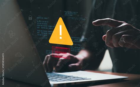 People Hand Using Smartphone And Computer Laptop That Show Warning Sign After Got Attack By