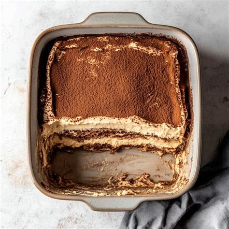 Tiramisu In A Square Dish With A Slice Taken Out R Tiramisu Food