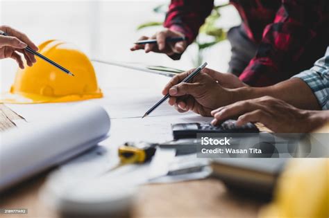 Brainstorming Group Of Architects And Engineers Discuss Building