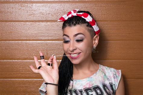 Fashion Large Portrait Of A Stylish Girl With Dreadlocks Chewing Gum