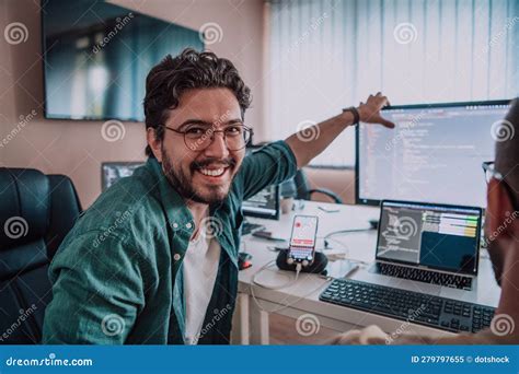 programmers engrossed in deep collaboration diligently working