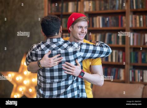 Two Guy Friends Hugging