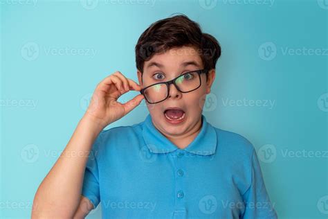 A Funny Very Shocked Handsome Boy Dark Haired Wearing Lopsided