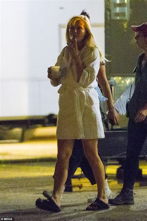 Kirsten Dunst Smokes Cigarette In Dressing Gown And Slippers On