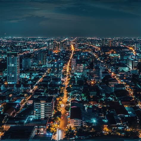 An Aerial View Of A City At Night Perfect For Urban Landscape Designs