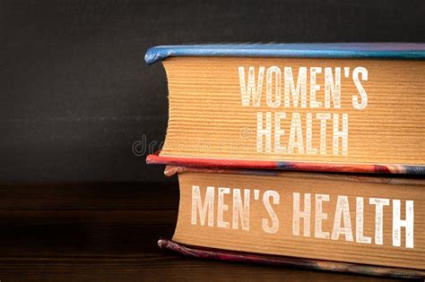 Mens And Womens Health Concept Stacked Books On Wooden Table Stock