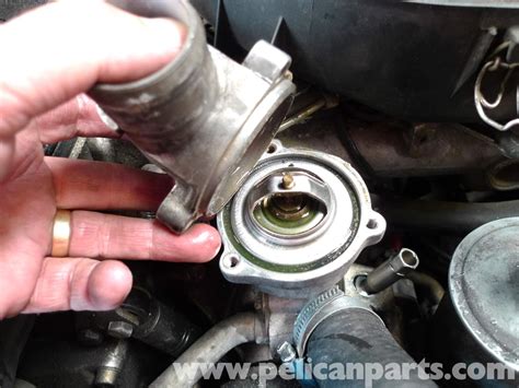 Mercedes Benz 190E Thermostat Replacement W201 1987 1993 Pelican Parts DIY Maintenance Article